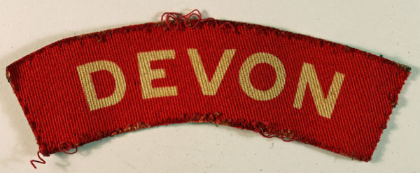 DEVON WW2 Printed Shoulder Title Badge – CALICO PRINTERS — Lot No. 5437 ...